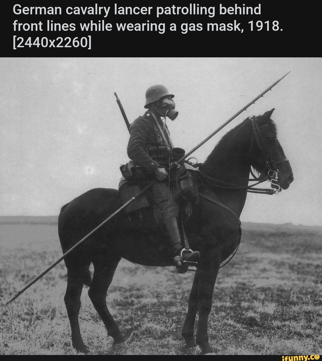 German cavalry lancer patrolling behind front lines while wearing a gas ...