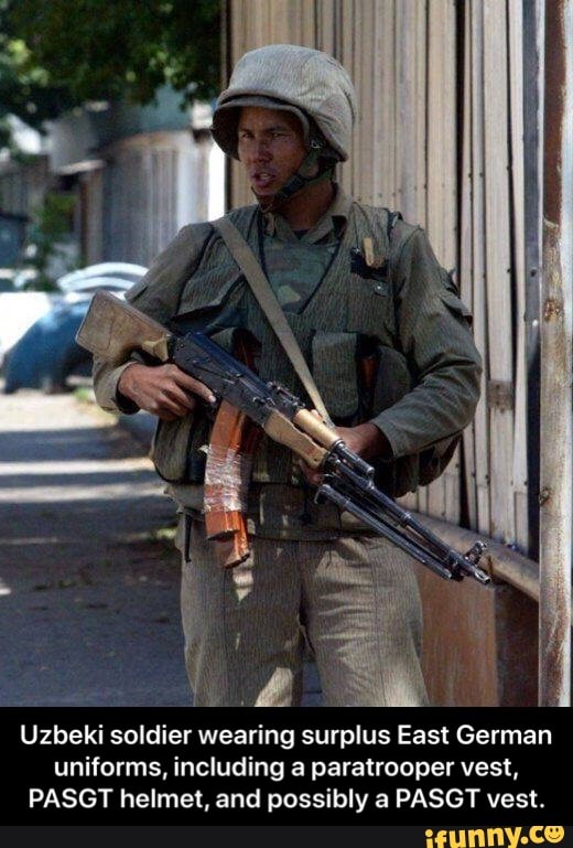 Uzbeki soldier wearing surplus East German uniforms, including a ...