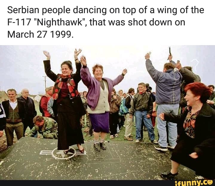 Serbian people dancing on top of a wing of the F-117 "Nighthawk", that ...