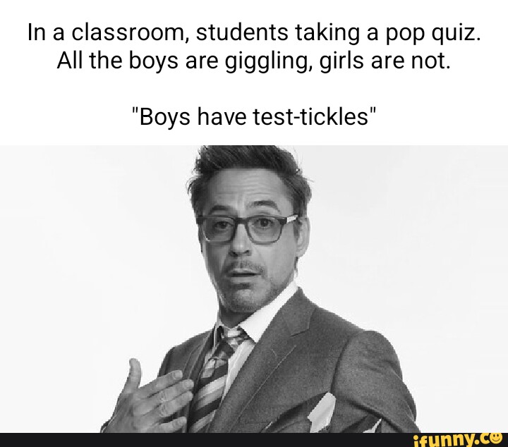 In a classroom, students taking a pop quiz. All the boys are giggling ...