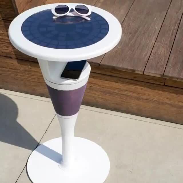 This is a 3-in-1 solar powered table with an integrated speaker and ...