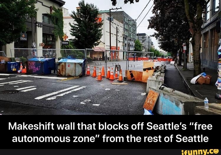 E h Las Makeshift wall that blocks off Seattle's "free autonomous zone ...