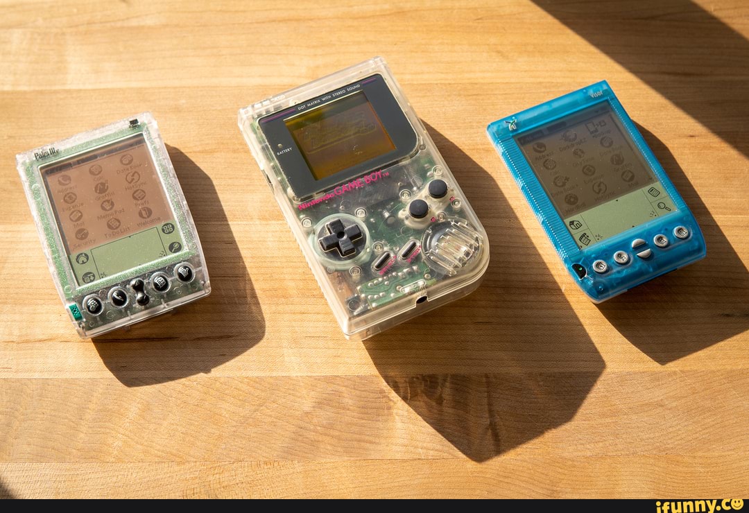 From left to right: a Palm IIIe, a "Play It Loud!" Nintendo Game Boy ...