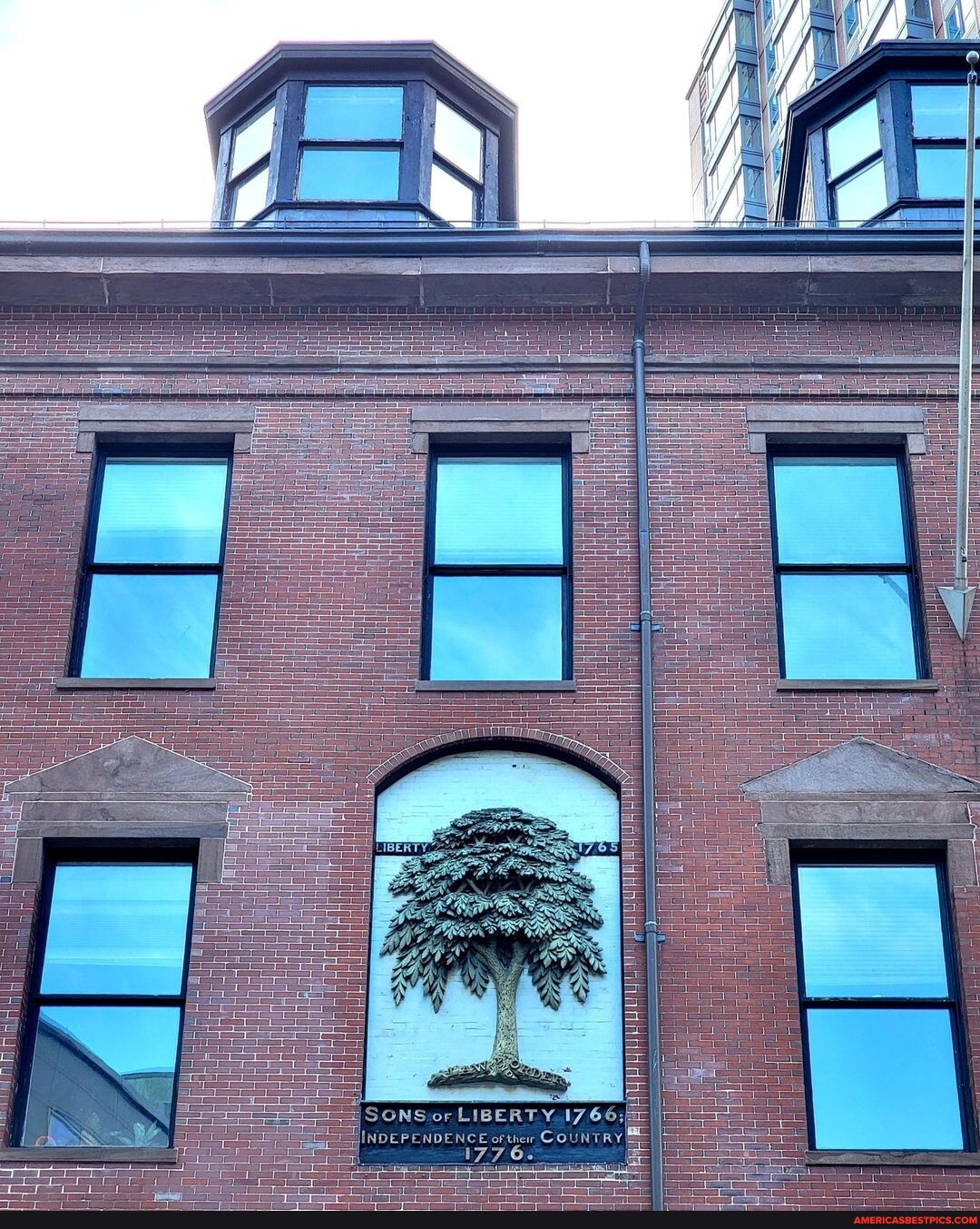A plaque to Liberty Tree, the famous elm tree where colonists staged ...