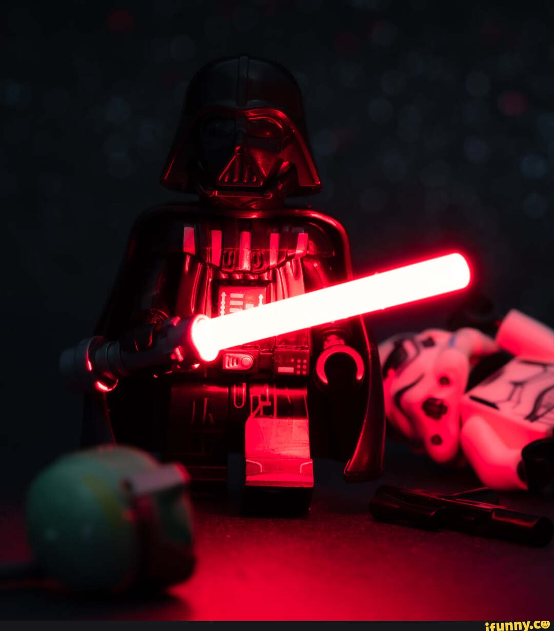 Darth Vader Lego figurine, long exposure, lightsaber illuminated with a ...