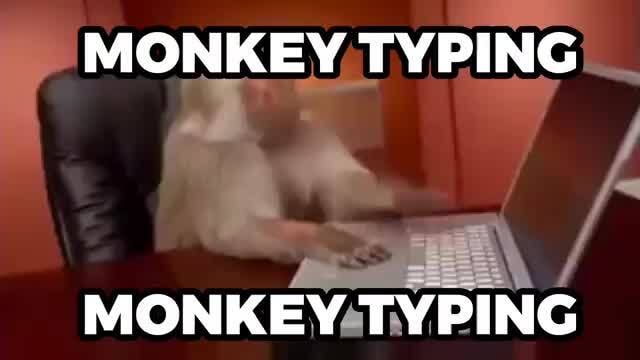 Monkey Typing On Keyboard