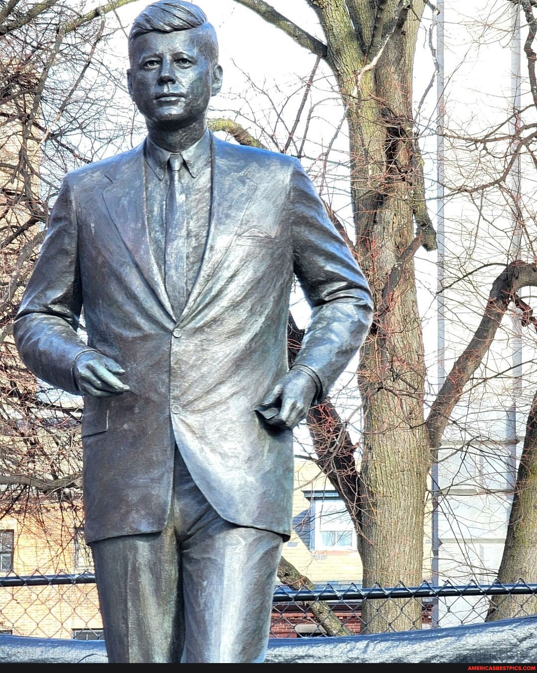 An eight foot tall statue of John F. Kennedy is installed outside the ...