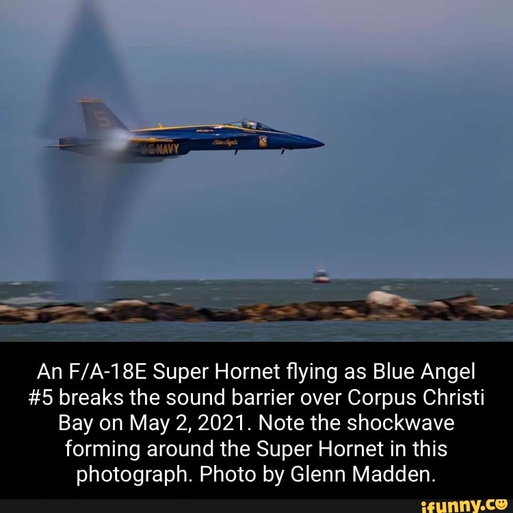 An Super Hornet flying as Blue Angel #5 breaks the sound barrier over ...