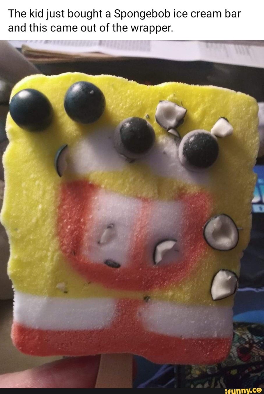The kid just bought a Spongebob ice cream bar and this came out of the ...