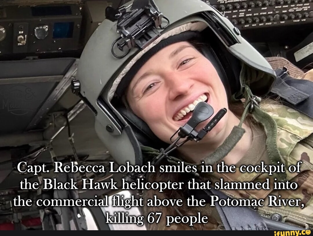 Capt. Rebecca Lobach smiles in the cockpit of the Black Hawk helicopter ...