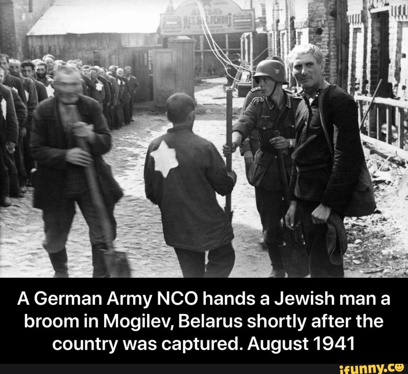 A German Army NCO hands a Jewish man a broom in Mogilev, Belarus ...