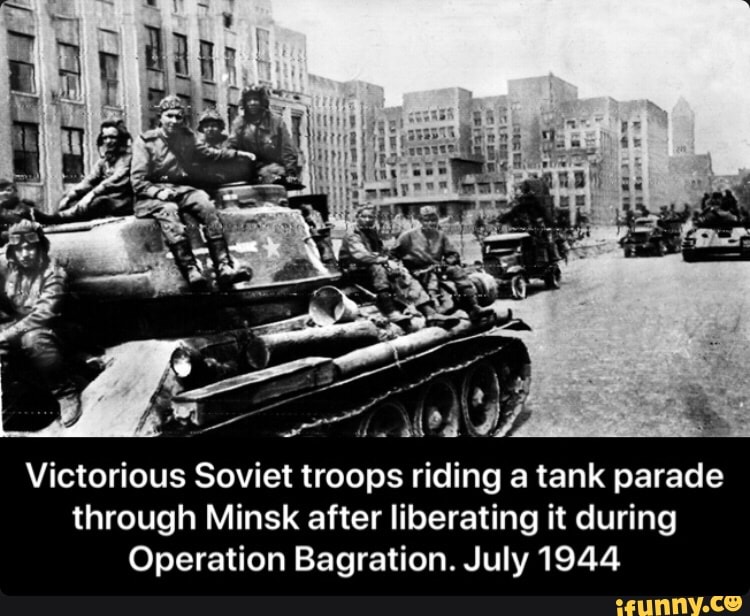 Victorious Soviet troops riding a tank parade through Minsk after ...