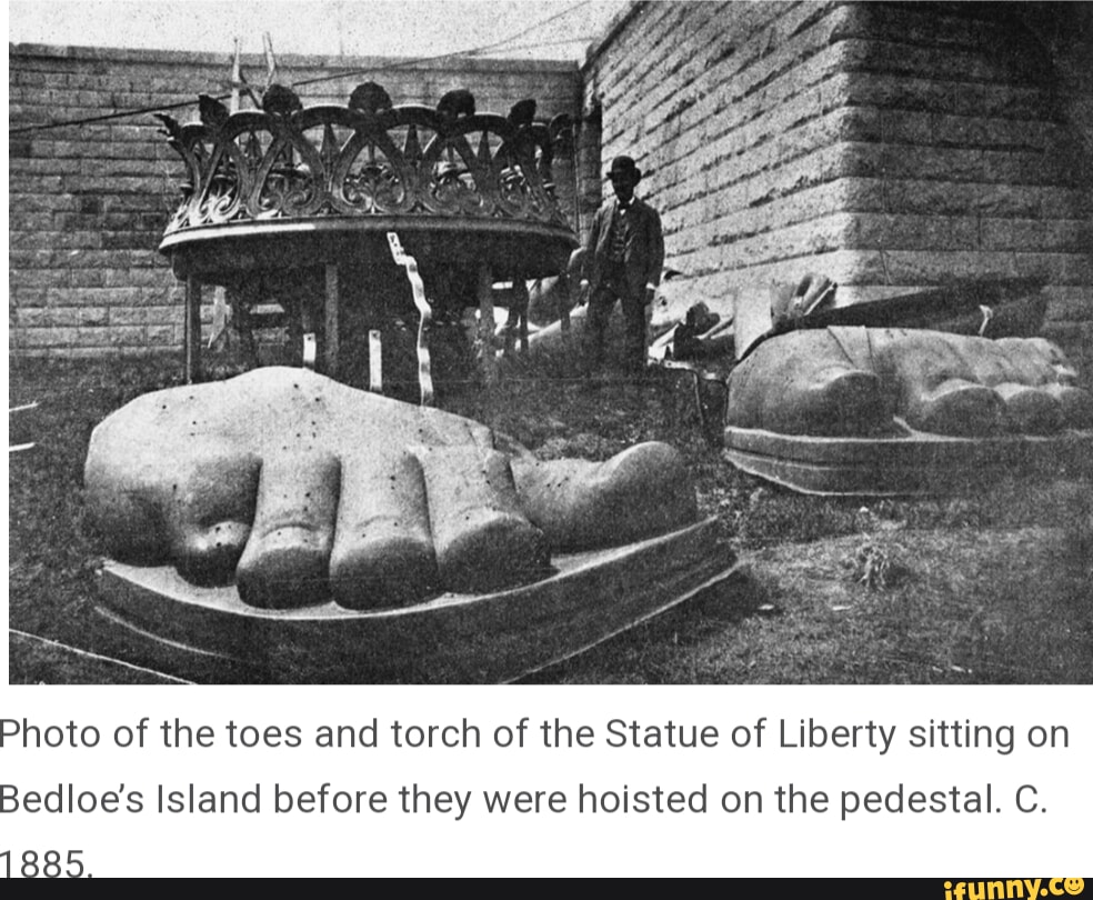 Photo of the toes and torch of the Statue of Liberty sitting on Bedloe ...