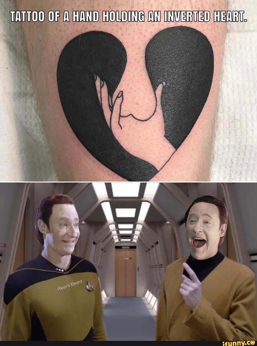 TATTOO OF A HAND HOLDING AN INVERTED HEART. - iFunny