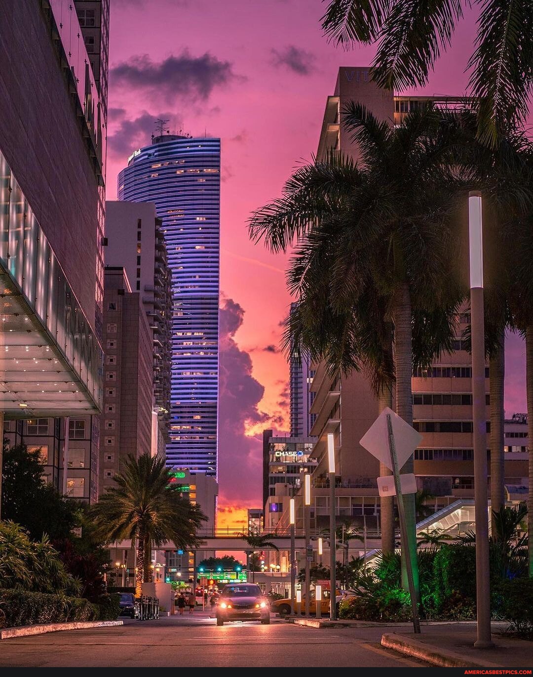 Witness the magic as the Miami sky blushes in shades of pink, casting a ...