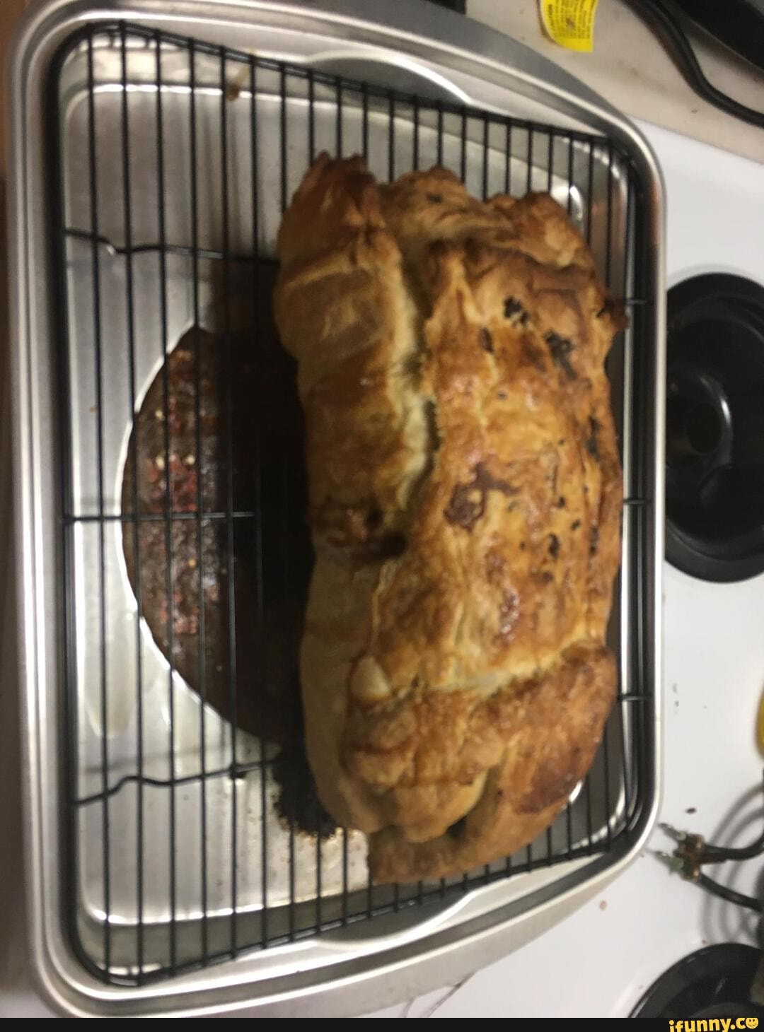 One beef Wellington. Little ugly looking. Pain in the ass to cook. It ...