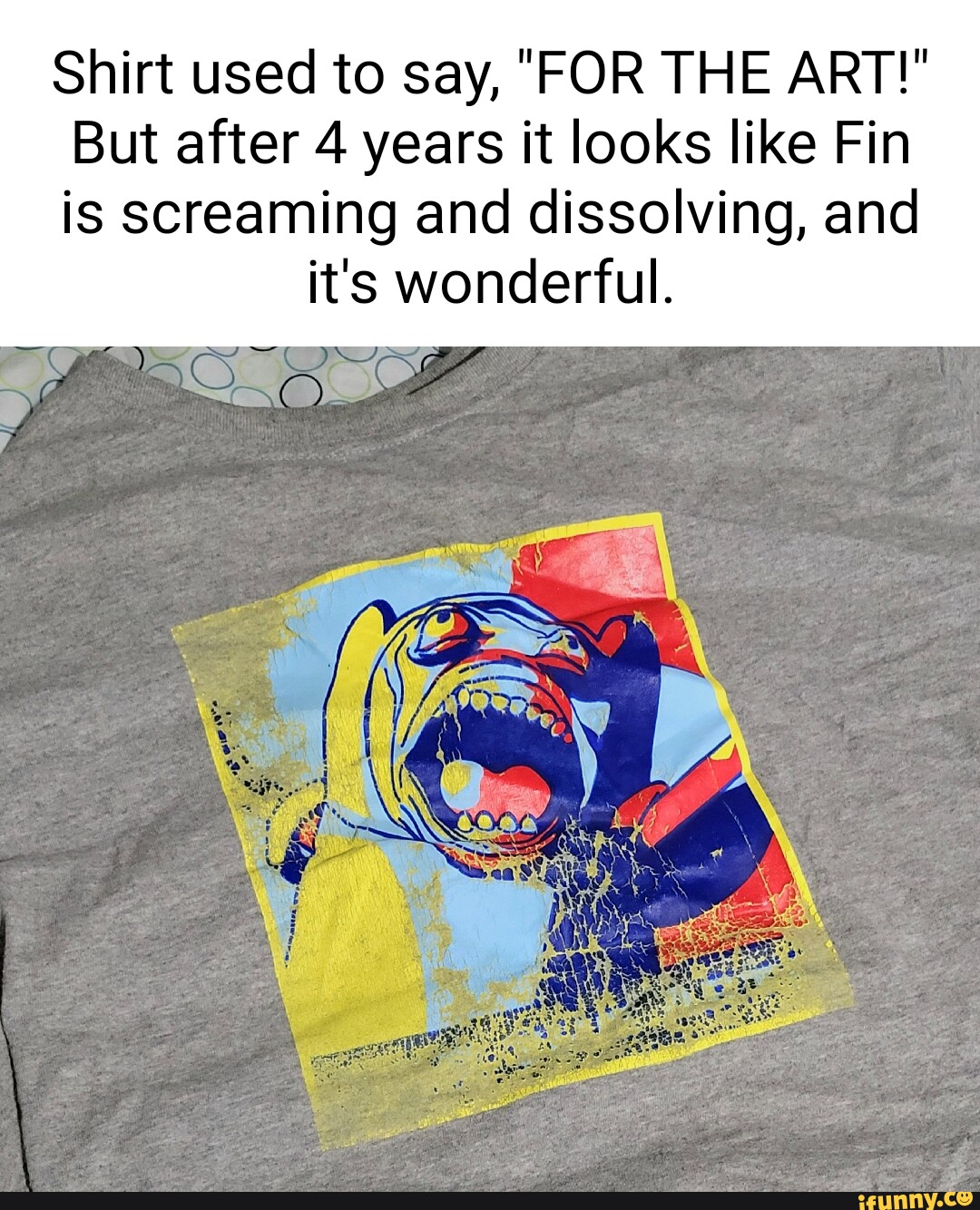 Shirt used to say, "FOR THE ART!" But after 4 years it looks like Fin ...