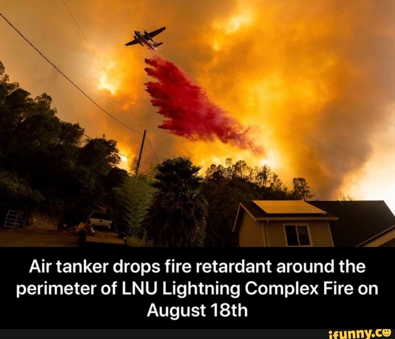 Air tanker drops fire retardant around the perimeter of LNU Lightning ...