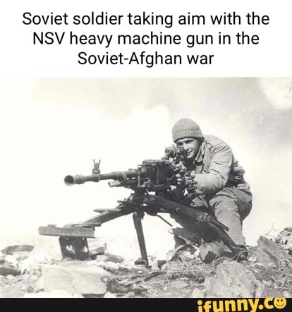 Soviet soldier taking aim with the NSV heavy machine gun in the Soviet ...