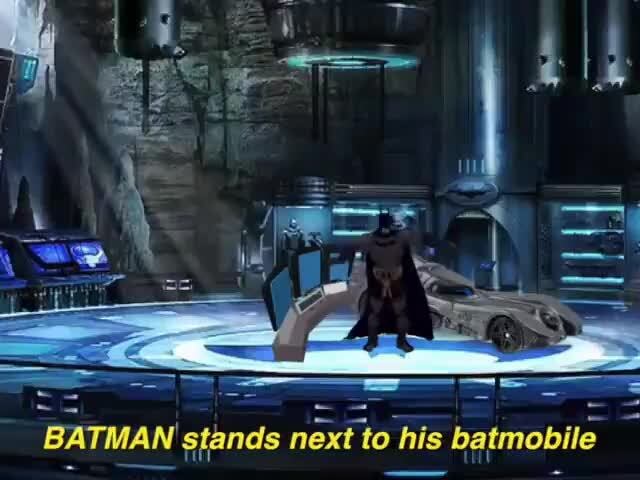 BATMAN stands next to his batmobile - )